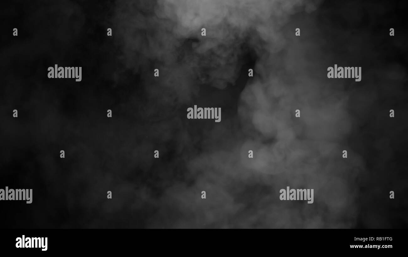 Smoke on the floor . Isolated black background Stock Photo - Alamy