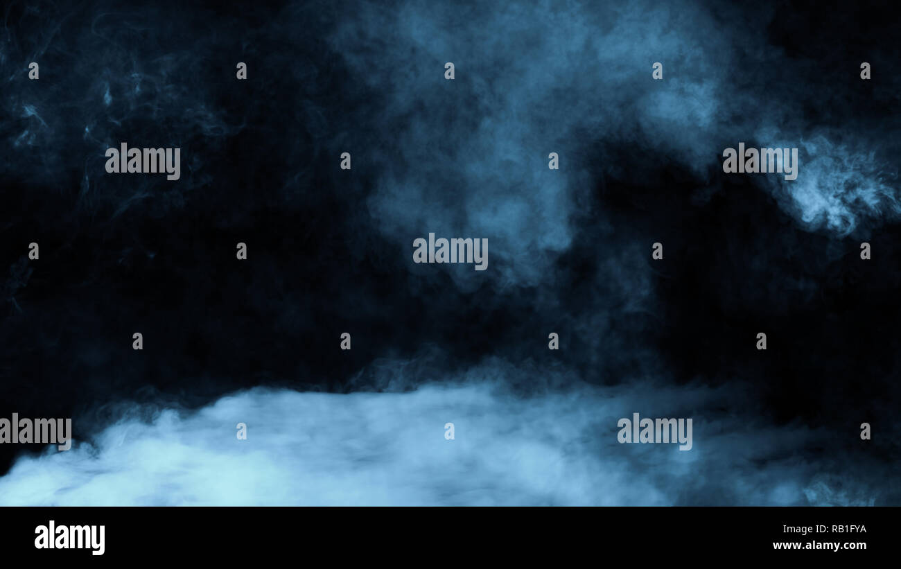 Blue toned . Rolling billows of smoke mist clouds from dry ice across ...