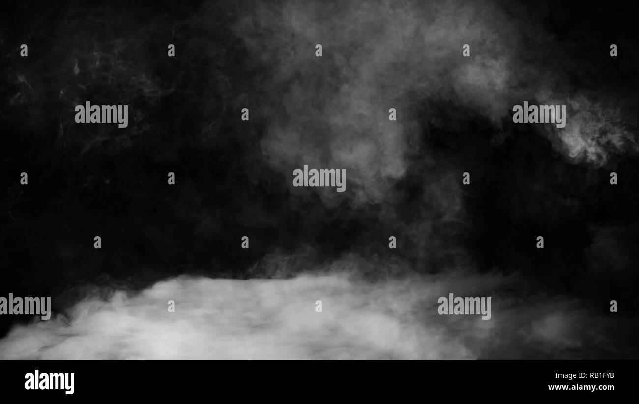 Rolling billows of smoke mist clouds from dry ice across the bottom ...