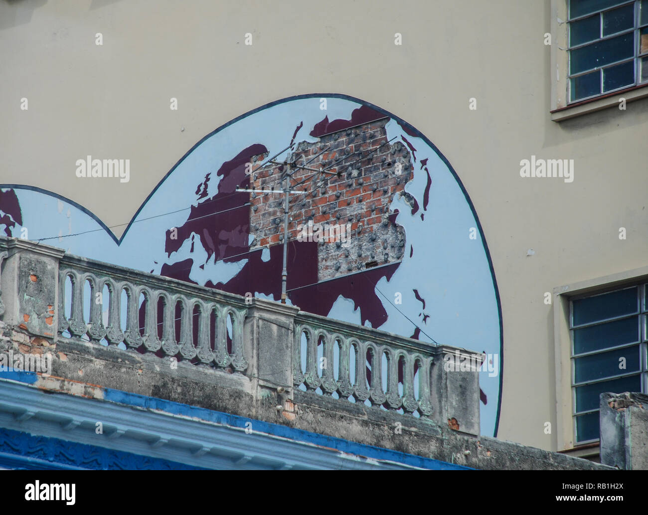 Destroyed world map on the wall of a house in Havana Stock Photo - Alamy