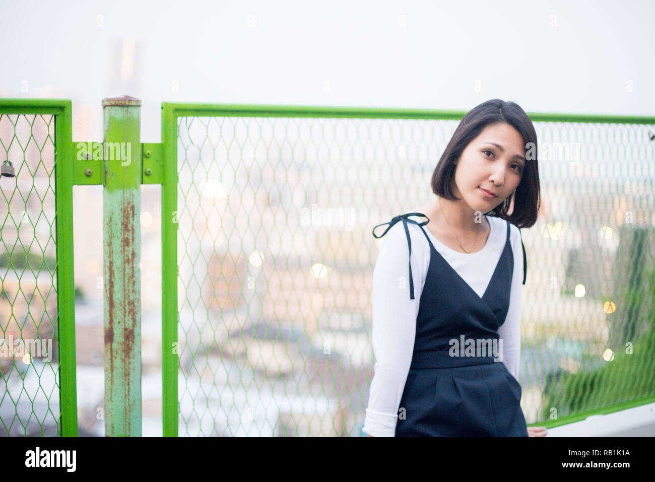 Japanese female model posing for the pictures on the street of Tokyo ...