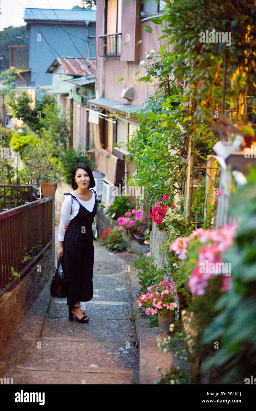 Japanese female model posing for the pictures on the street of Tokyo ...