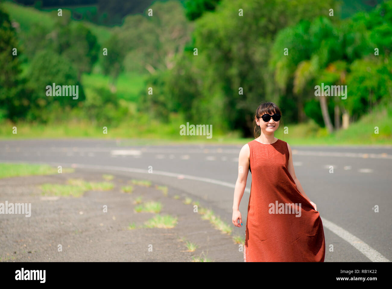 Japanese girl poses for picture in Gold Coast, Australia. Gold Coast is ...