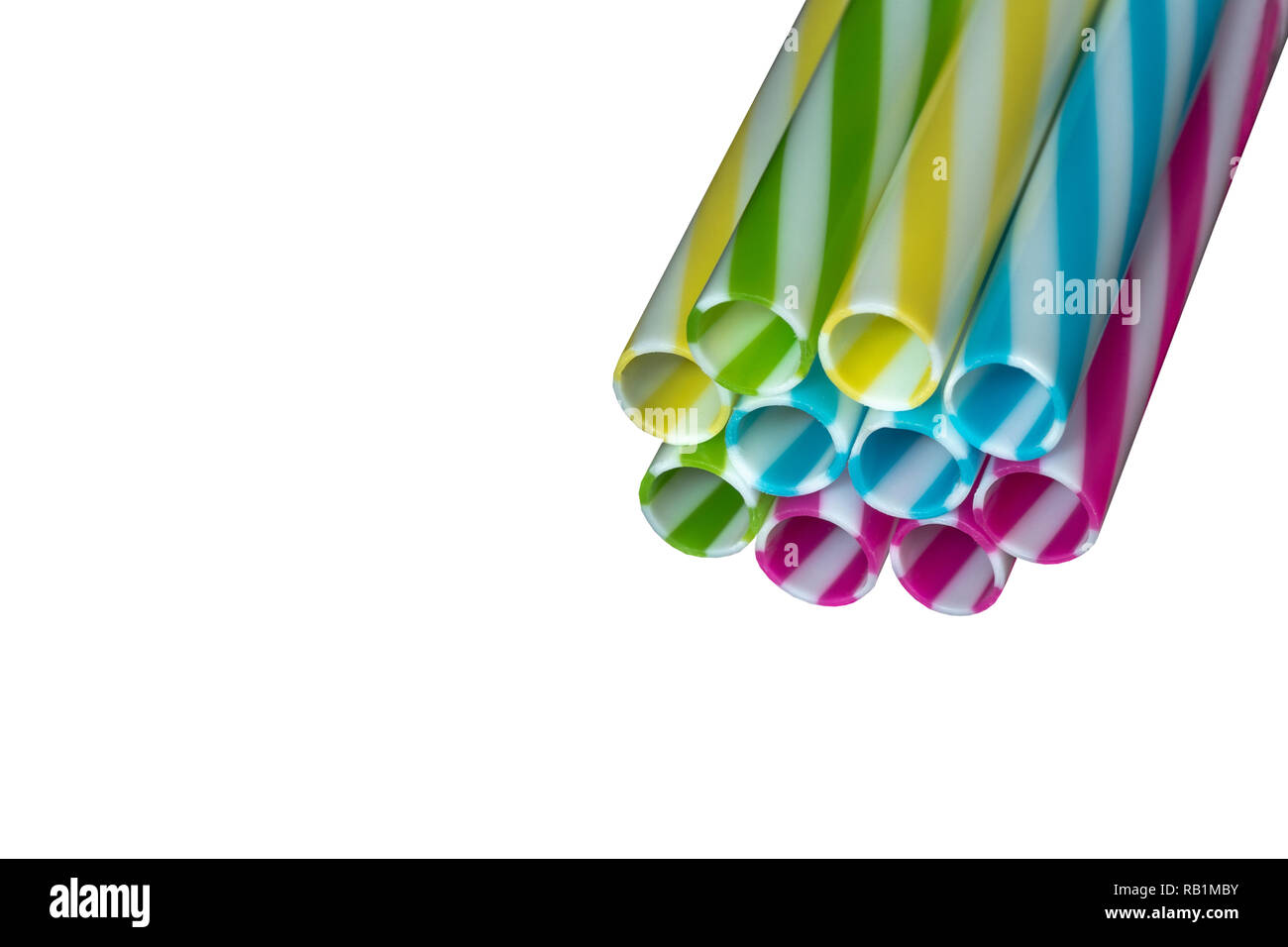 Colourly striped plastic drinking straws, black underground background ...