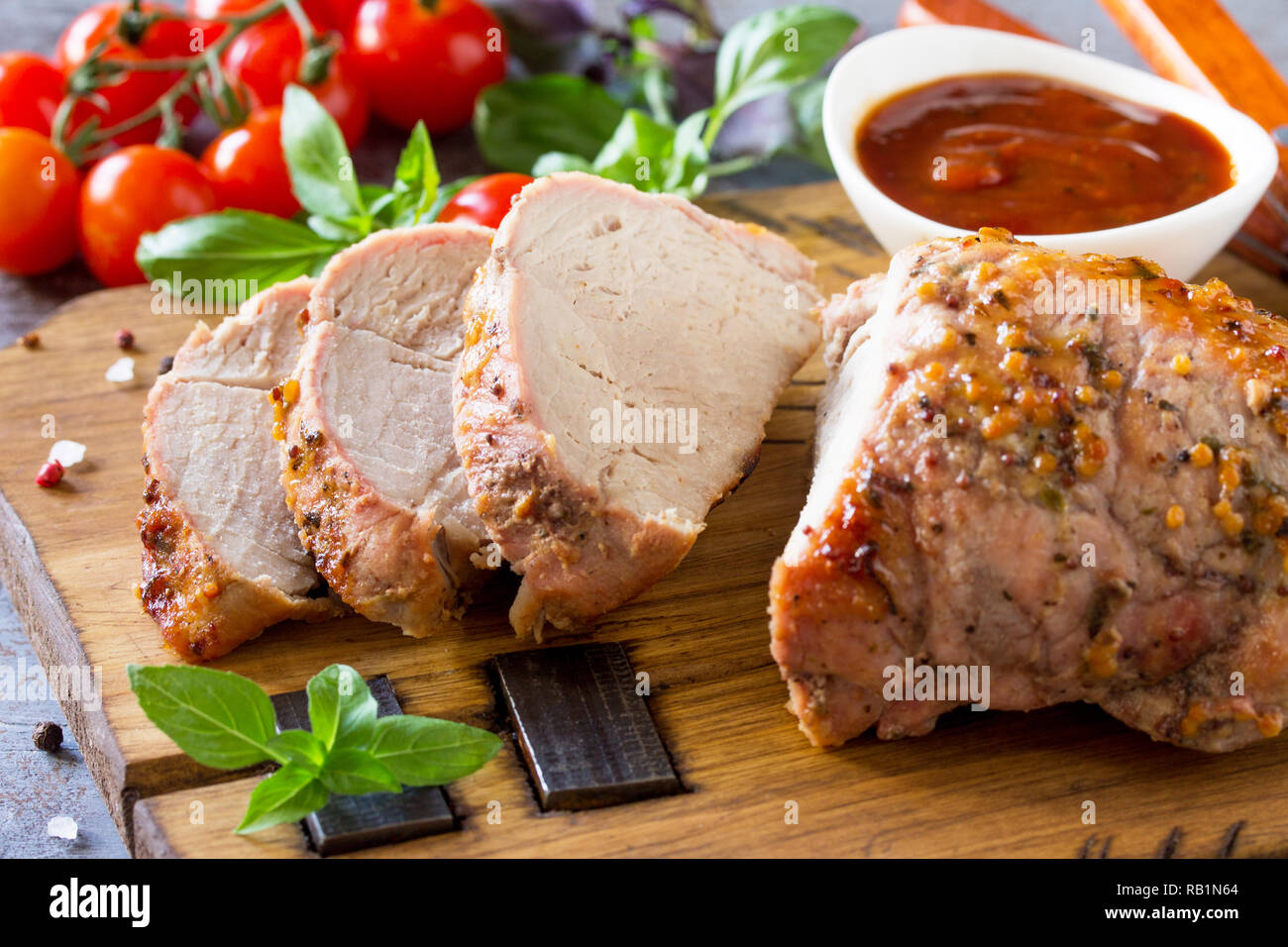 Baked Meat close-up. Roast pork Meat with honey-mustard glaze served ...