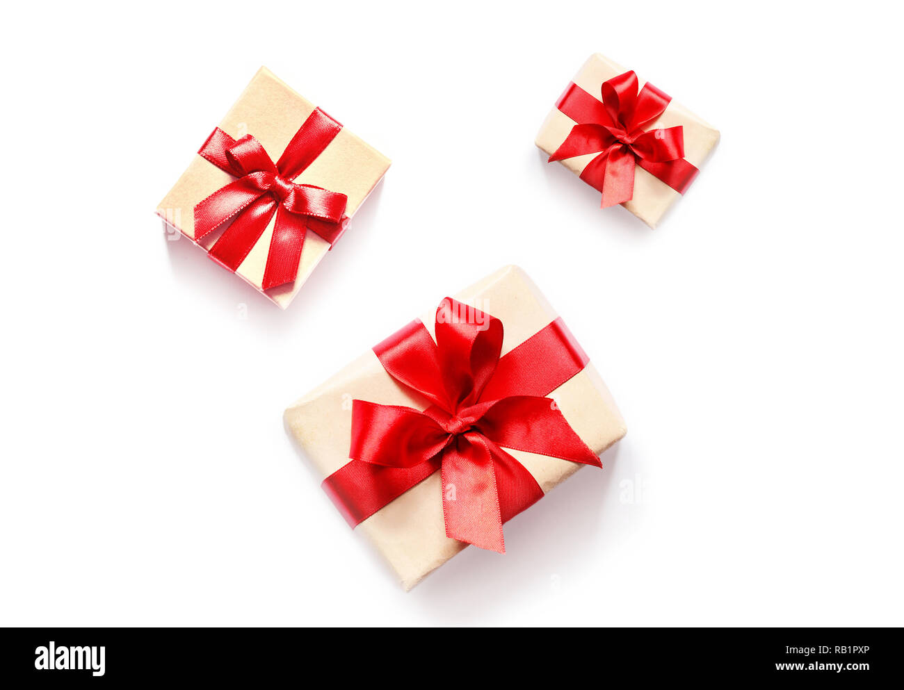 Gift box with red ribbon isolated on white Stock Photo - Alamy