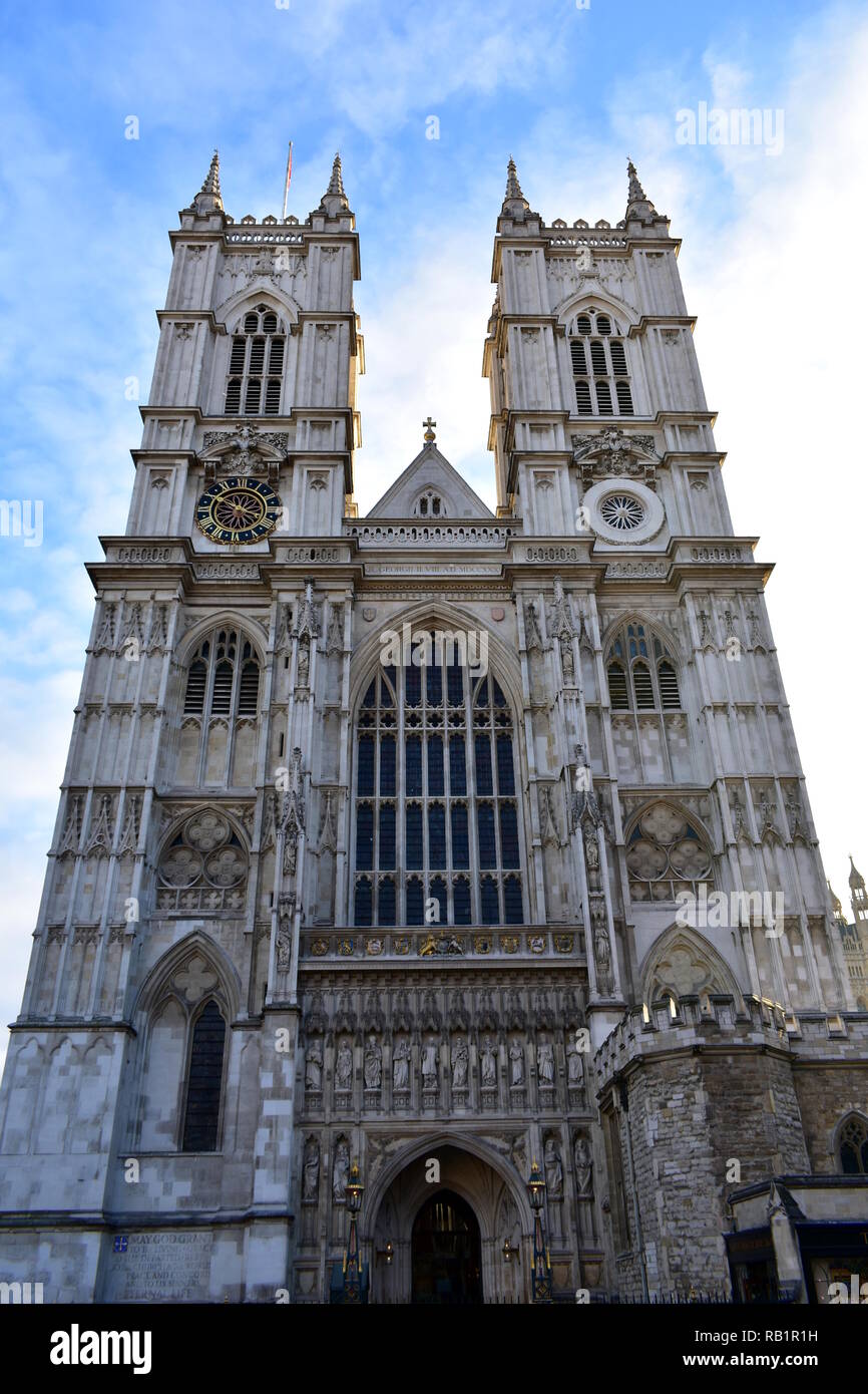 Westminster Abbey. West gothic facade and towers with clock, windows ...