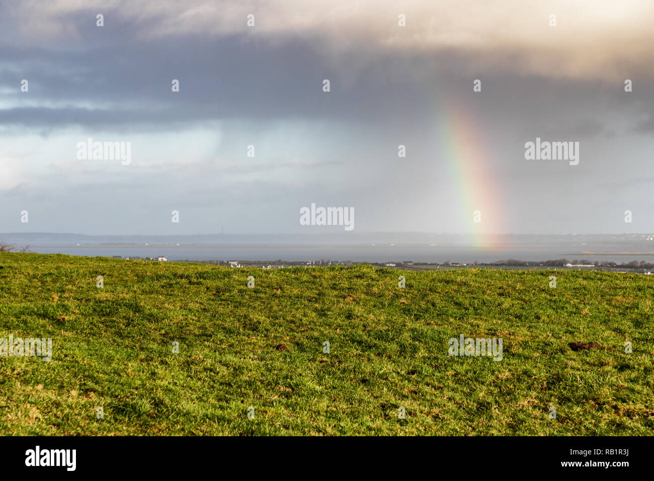 Rain and rainbow over Galway bay, Burren, Galway, Ireland Stock Photo ...