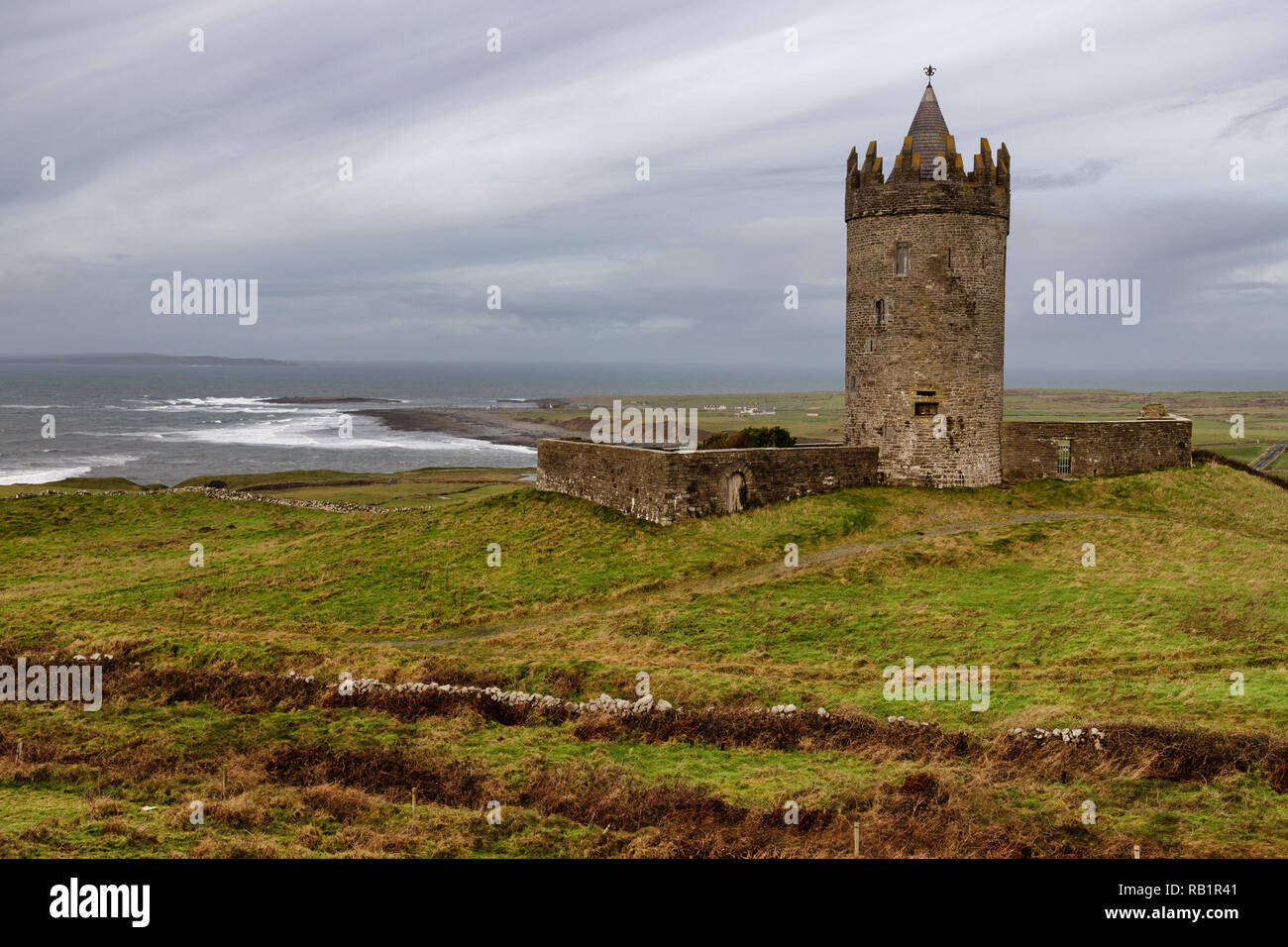 Tower of Doonagore Castle and vegetation in Doolin, Ireland Stock Photo ...
