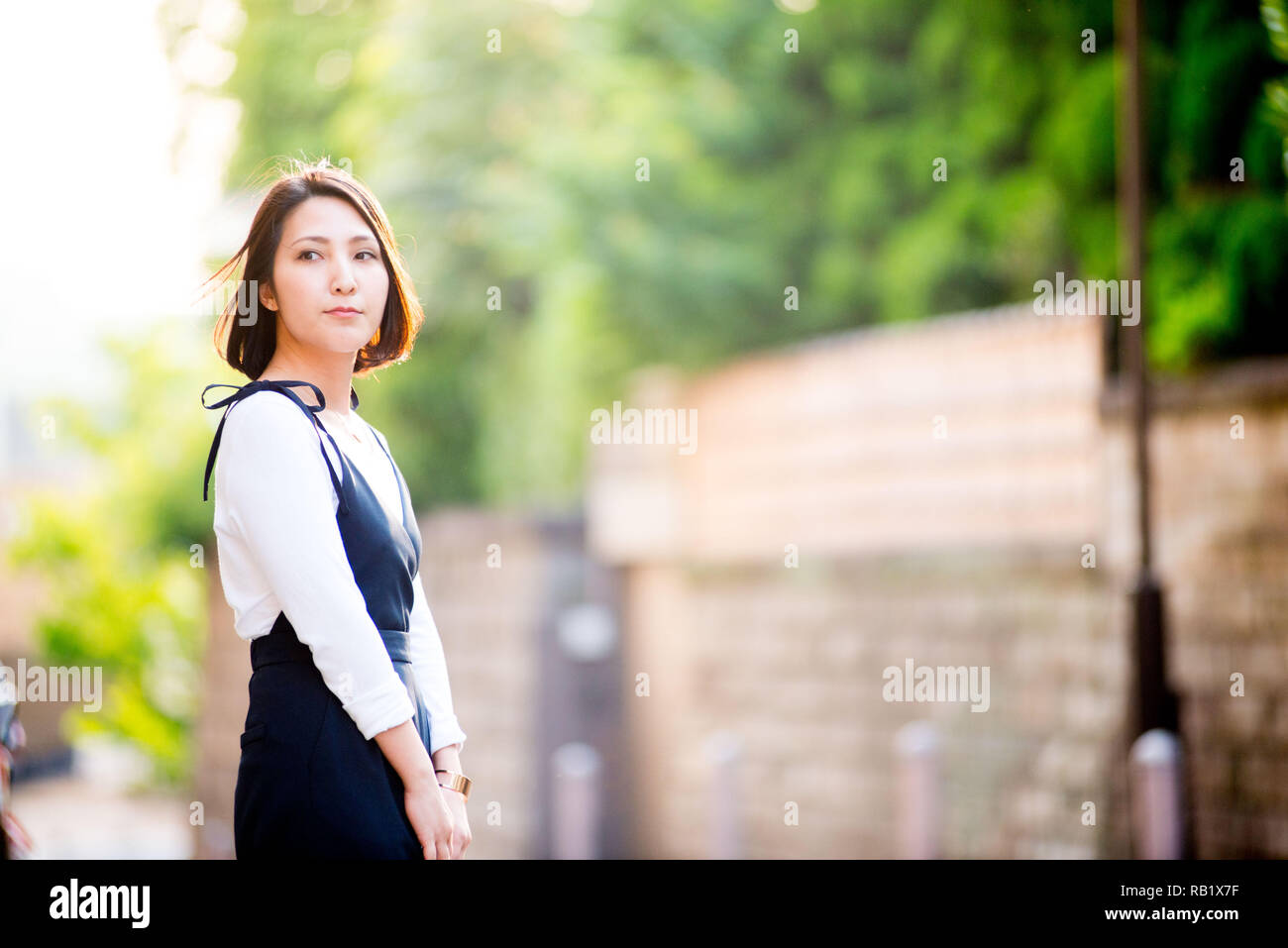 Japanese female model posing for the pictures on the street of Tokyo ...
