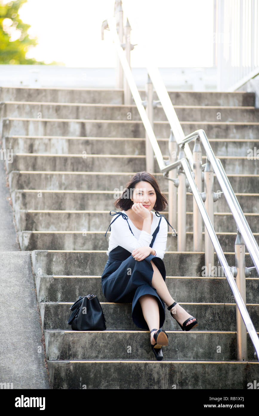 Japanese female model posing for the pictures on the street of Tokyo ...