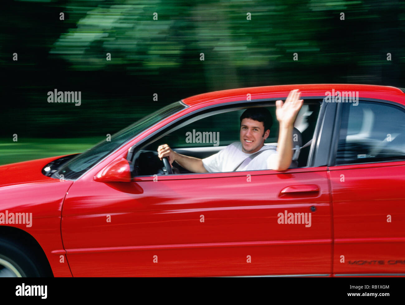 Hand waving from car hi-res stock photography and images - Alamy