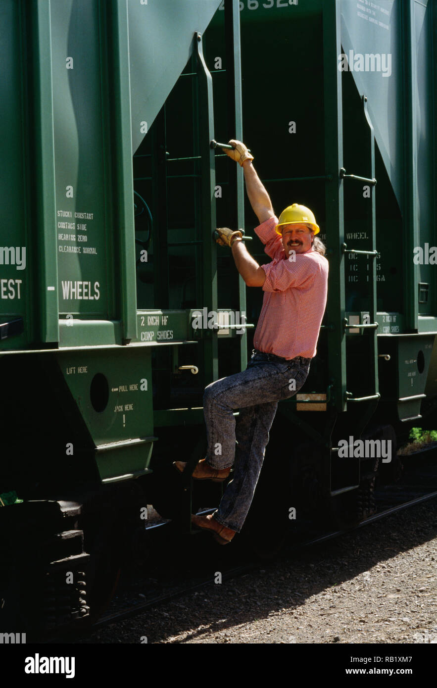 Train Worker on a Car Ladder, USA Stock Photo - Alamy