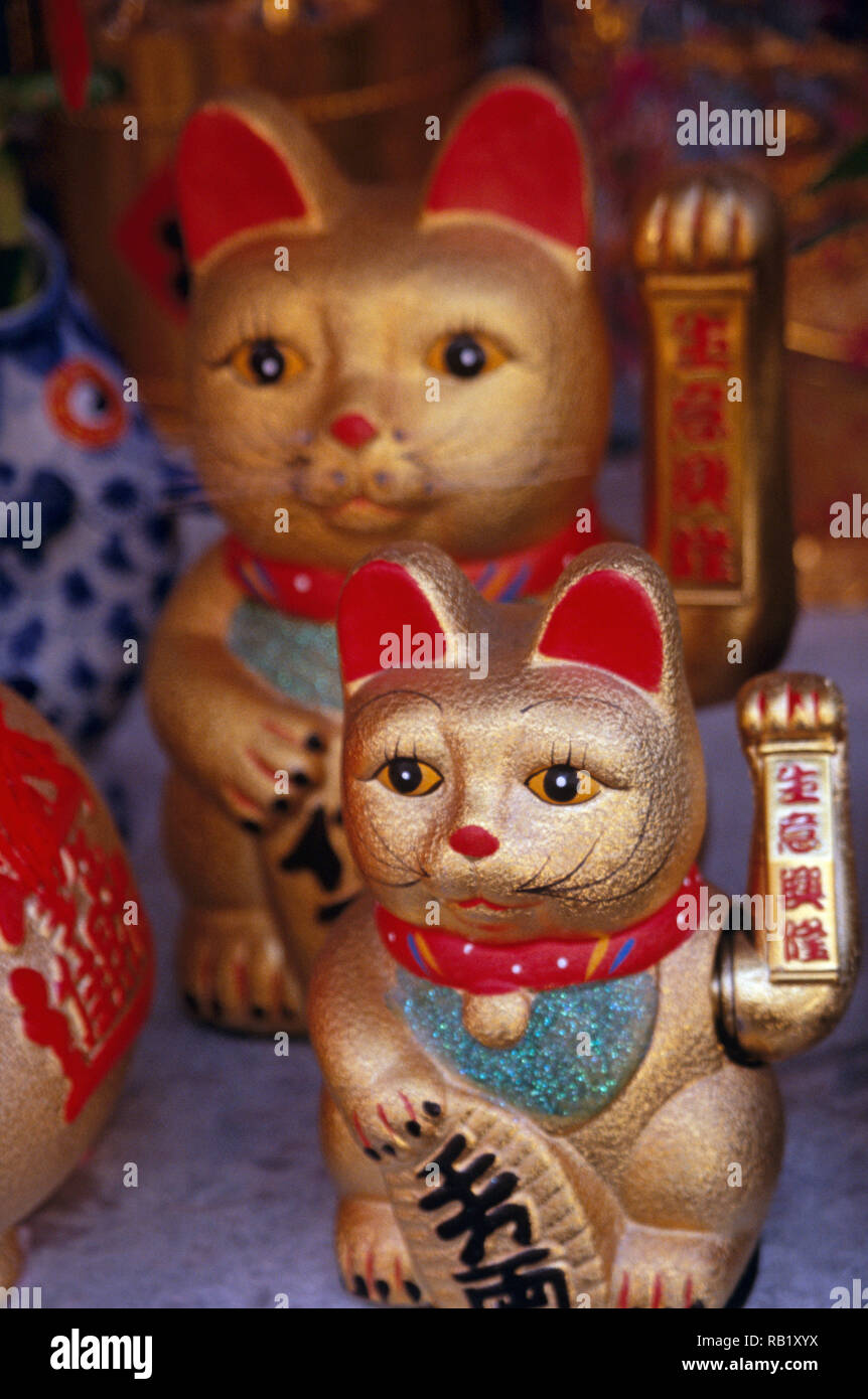Maneki Neko Sculptures,"Beckoning Cat", Chinatown, NYC Stock Photo - Alamy
