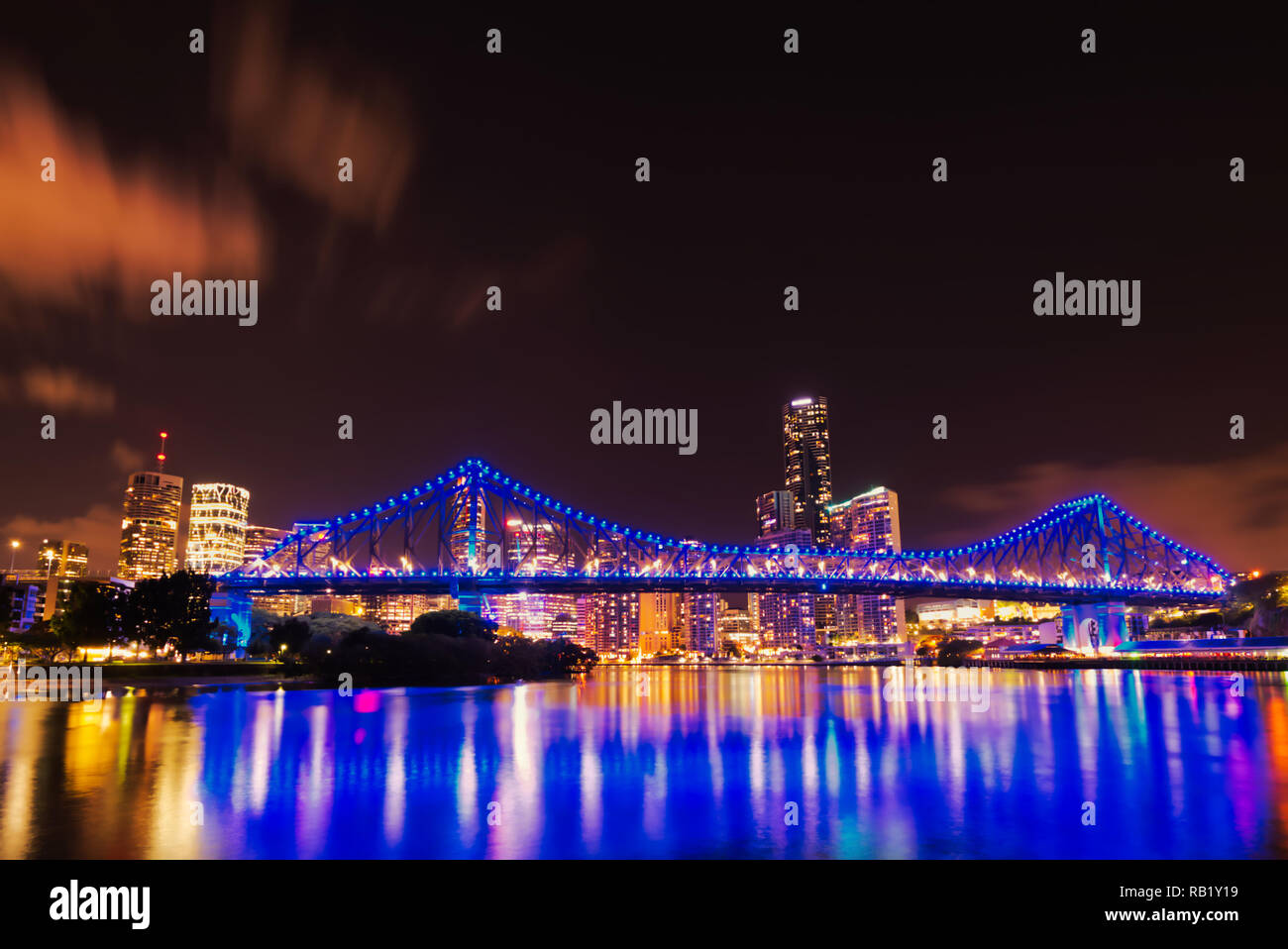Story Bridge at Night low angle cityscape showing light reflections on ...