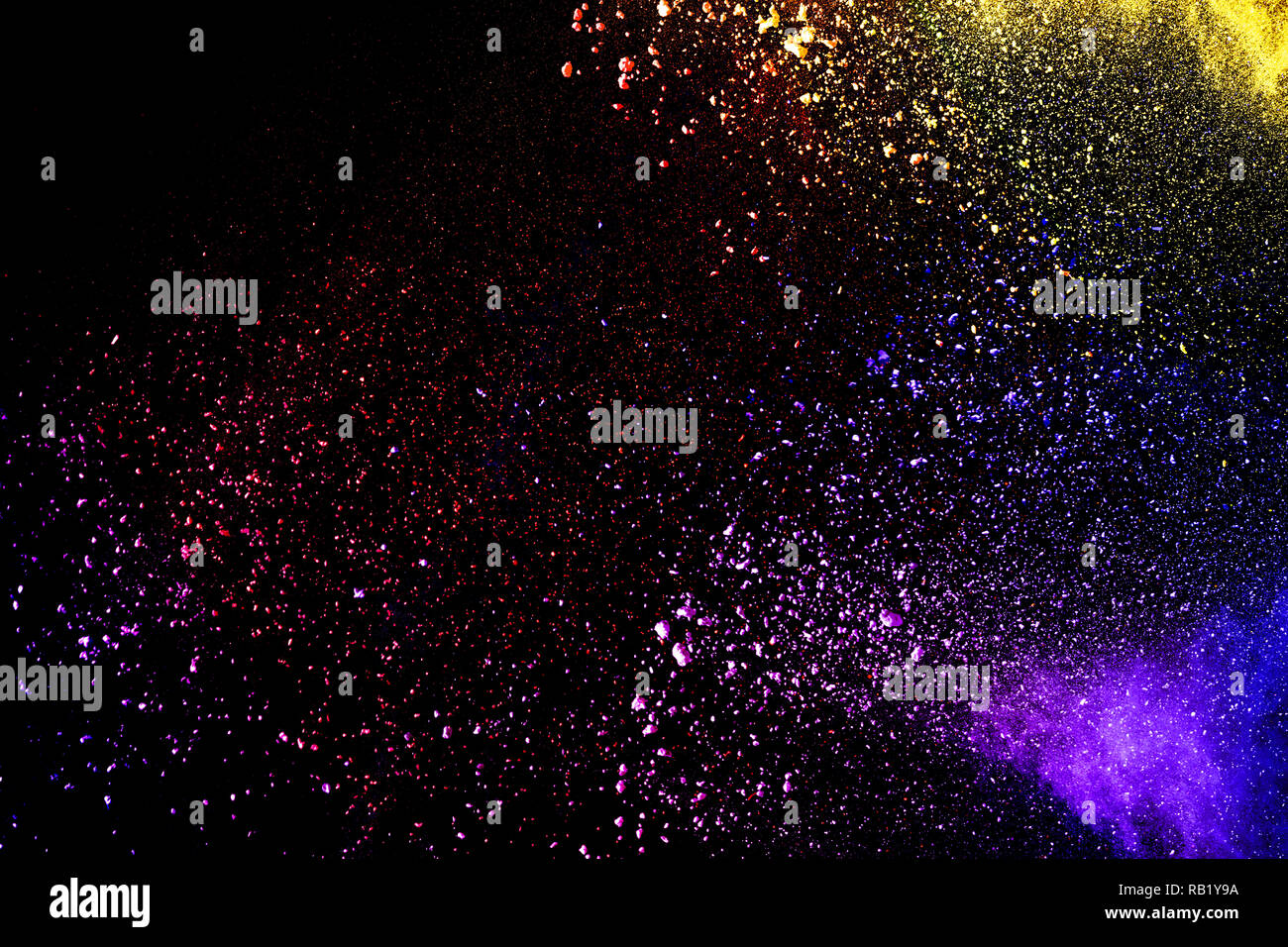 Color powder explosion cloud on black background. Freeze motion of ...