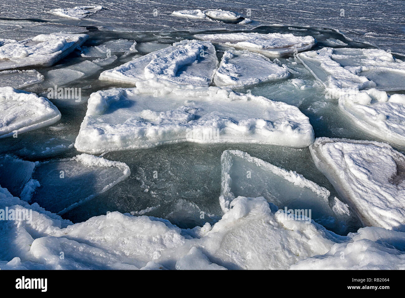 Crashed melting ice near the coastline Stock Photo - Alamy