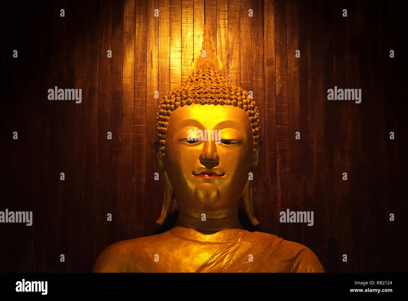 Light ray on gold buddha status Stock Photo - Alamy