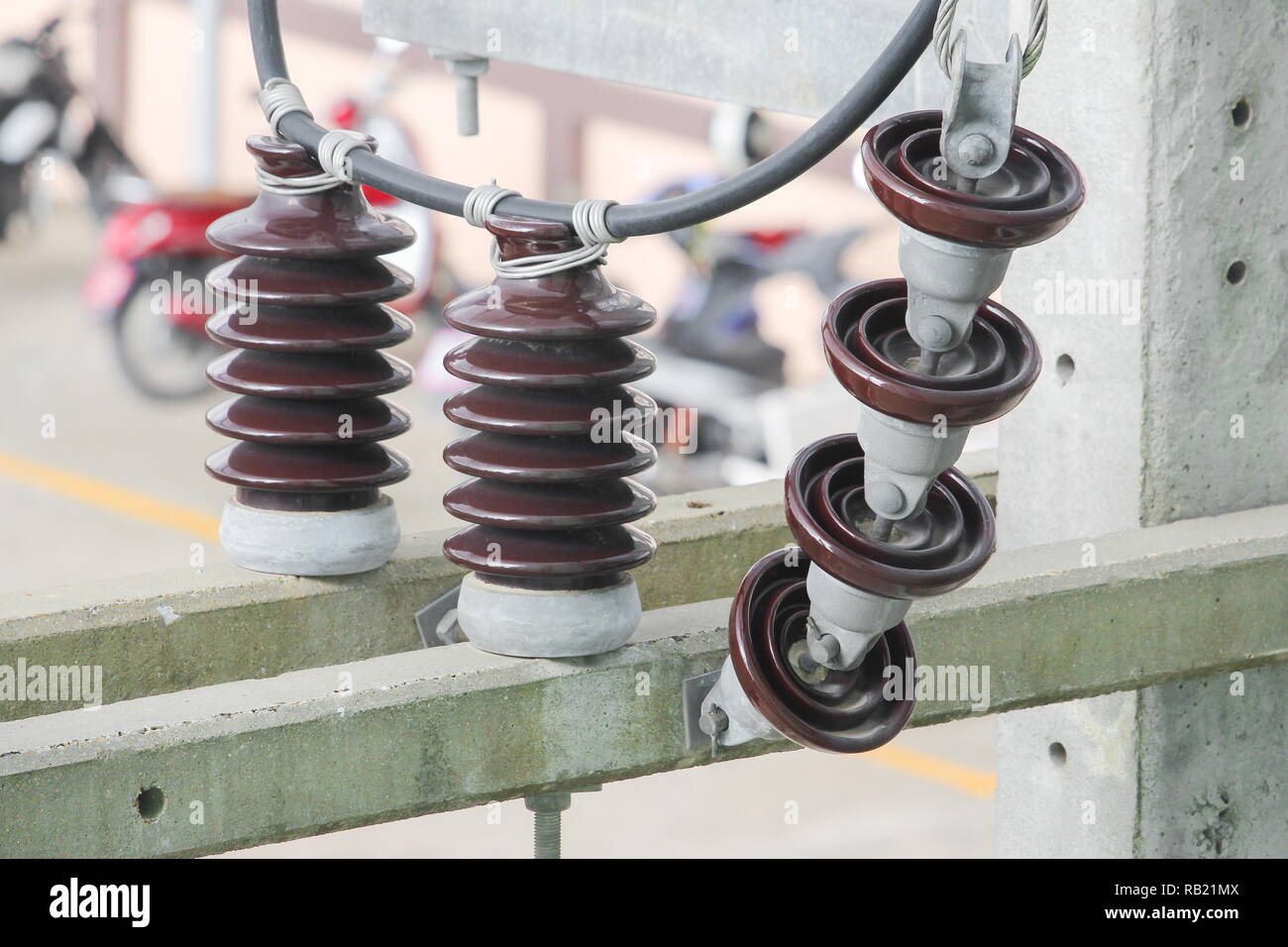Electricity porcelain insulator on pole Stock Photo - Alamy