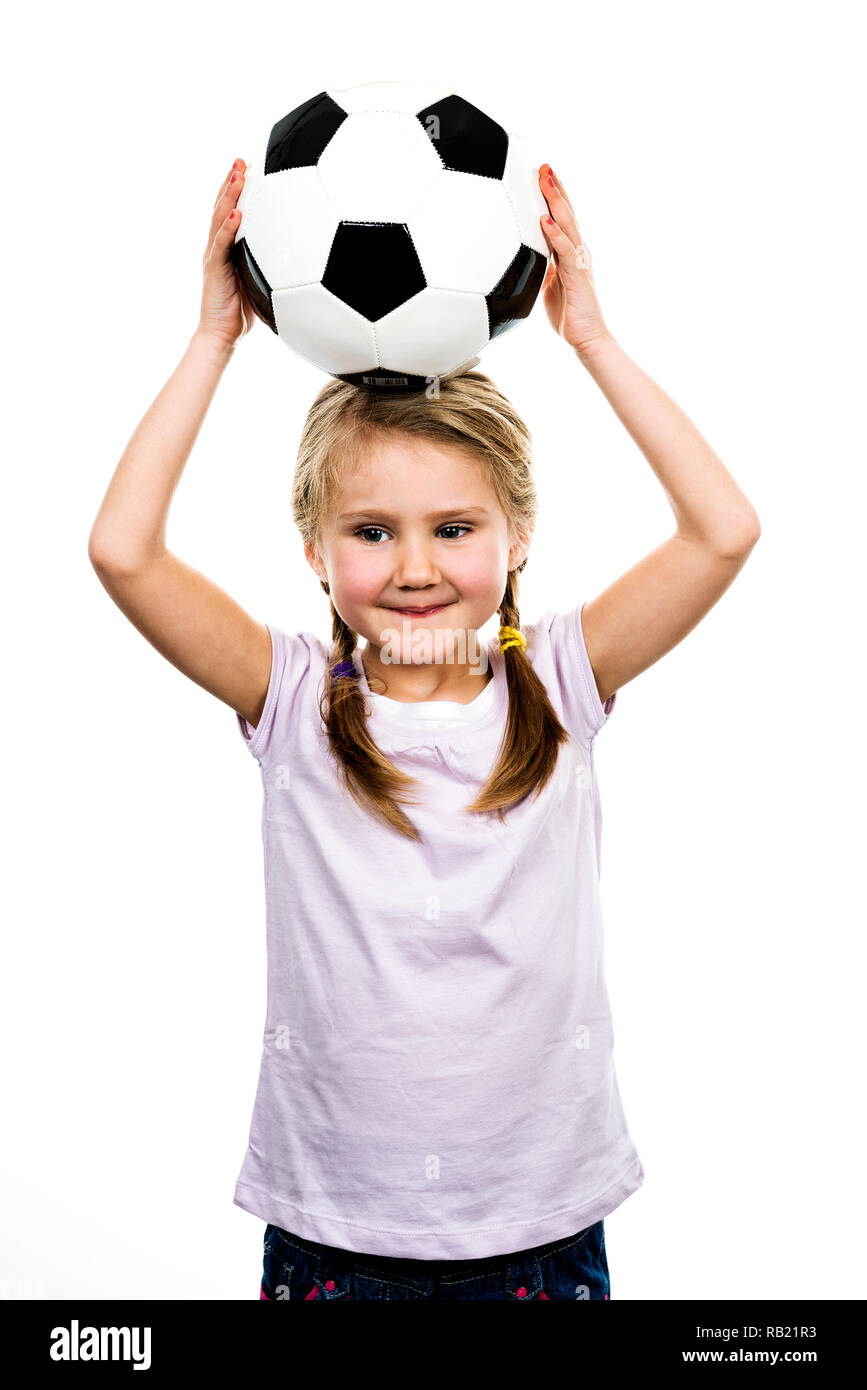 Cute girl playing football, happy child, young female goalkeeper ...