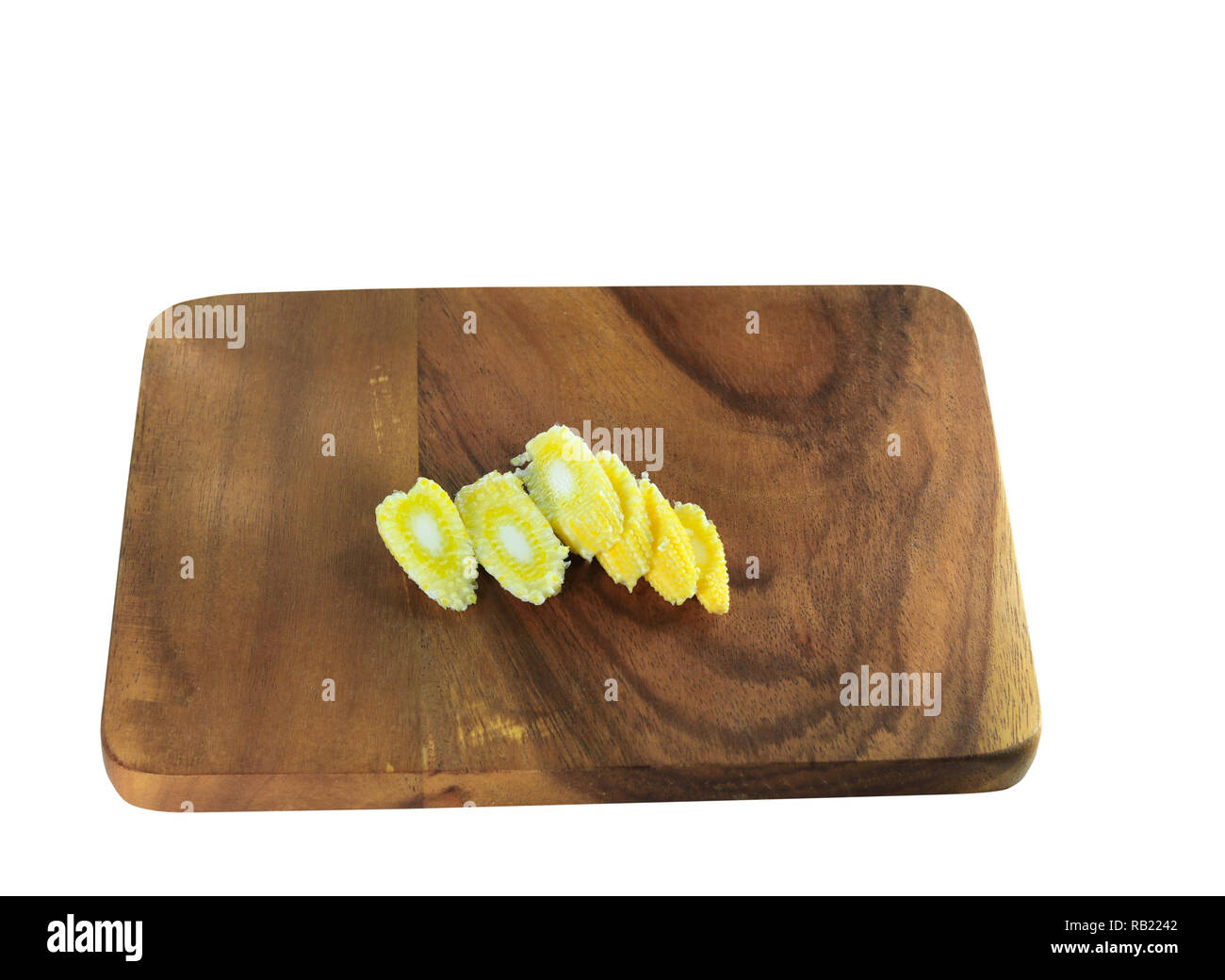 Young corn small. sliced slice on Chopping board. white background ...