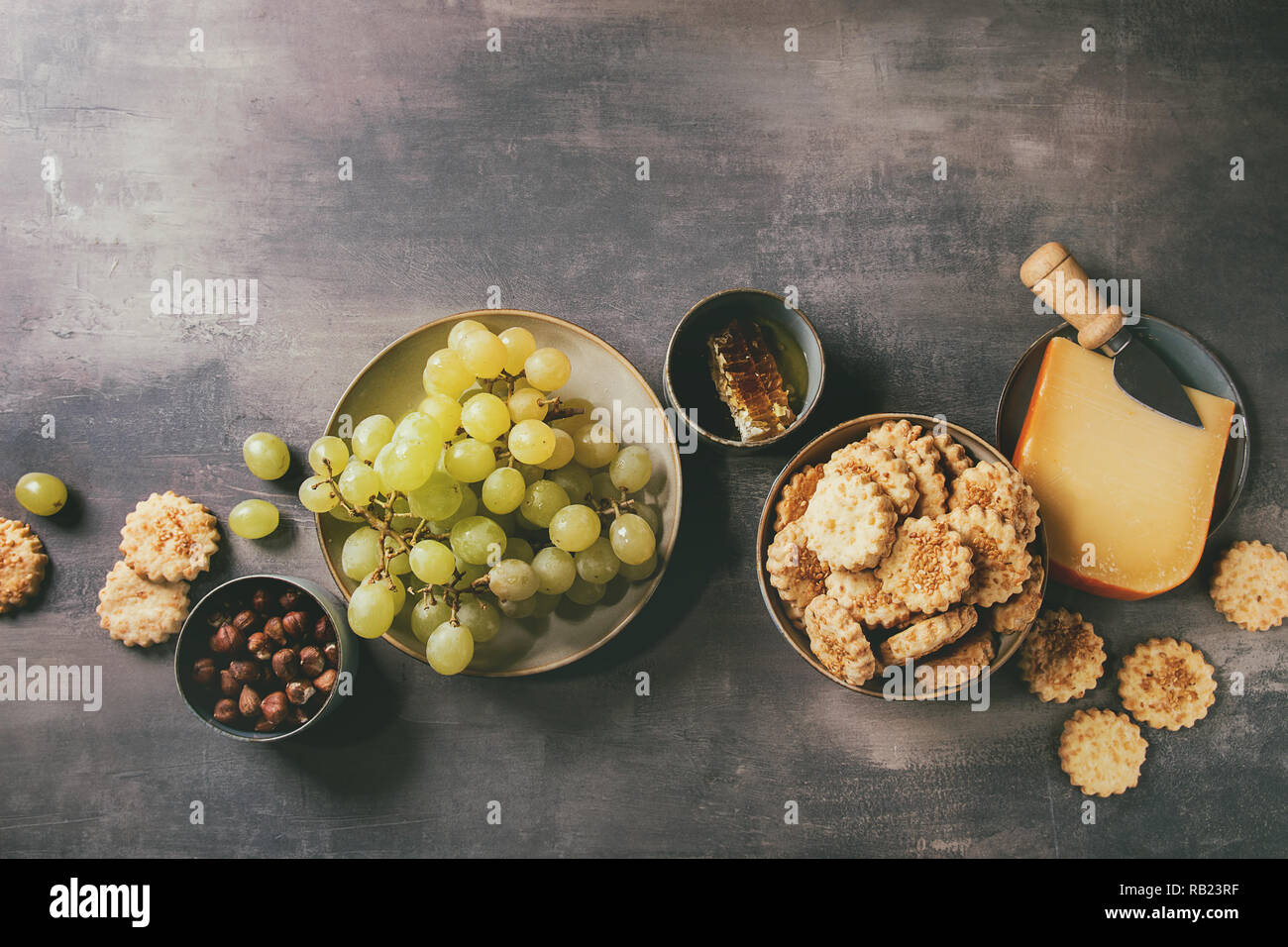 Cheese and grapes appetizer Stock Photo - Alamy