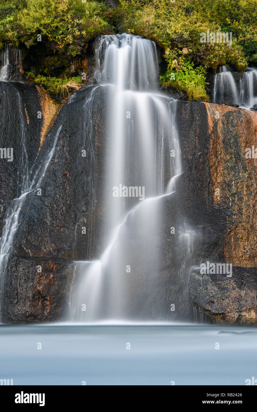 scenic blurred waterfall over rocks Stock Photo - Alamy