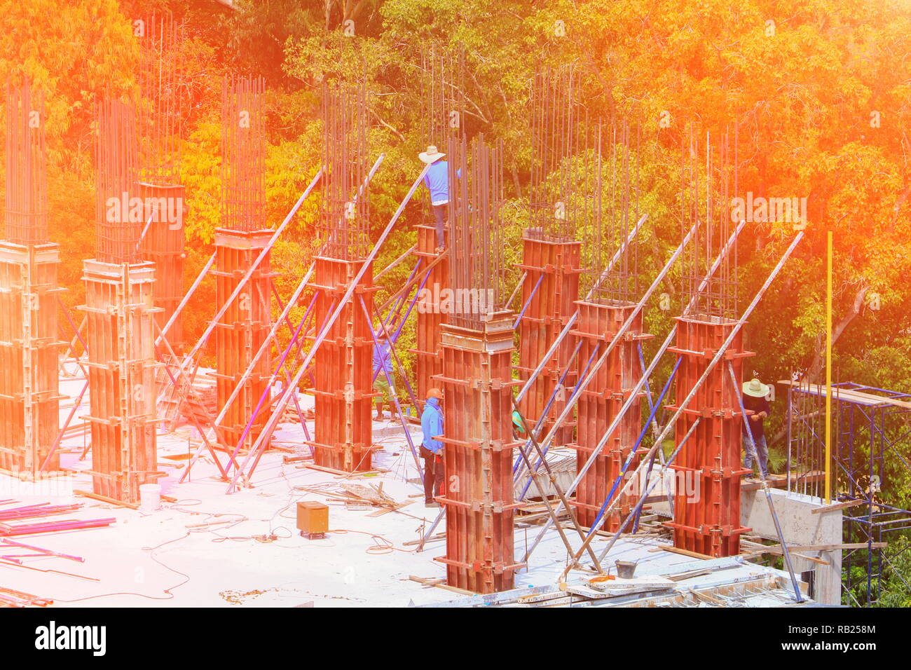 worker construction, building commercial in site workplace with sunrise ...