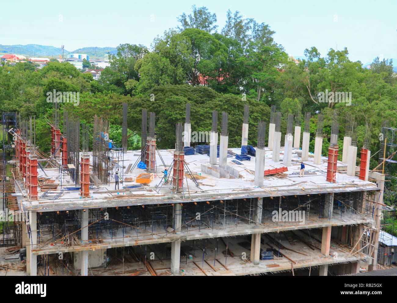worker construction team working on high ground building commercial in ...