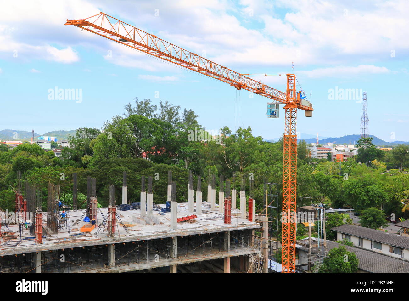 construction worker and crane, building commercial in site workplace ...