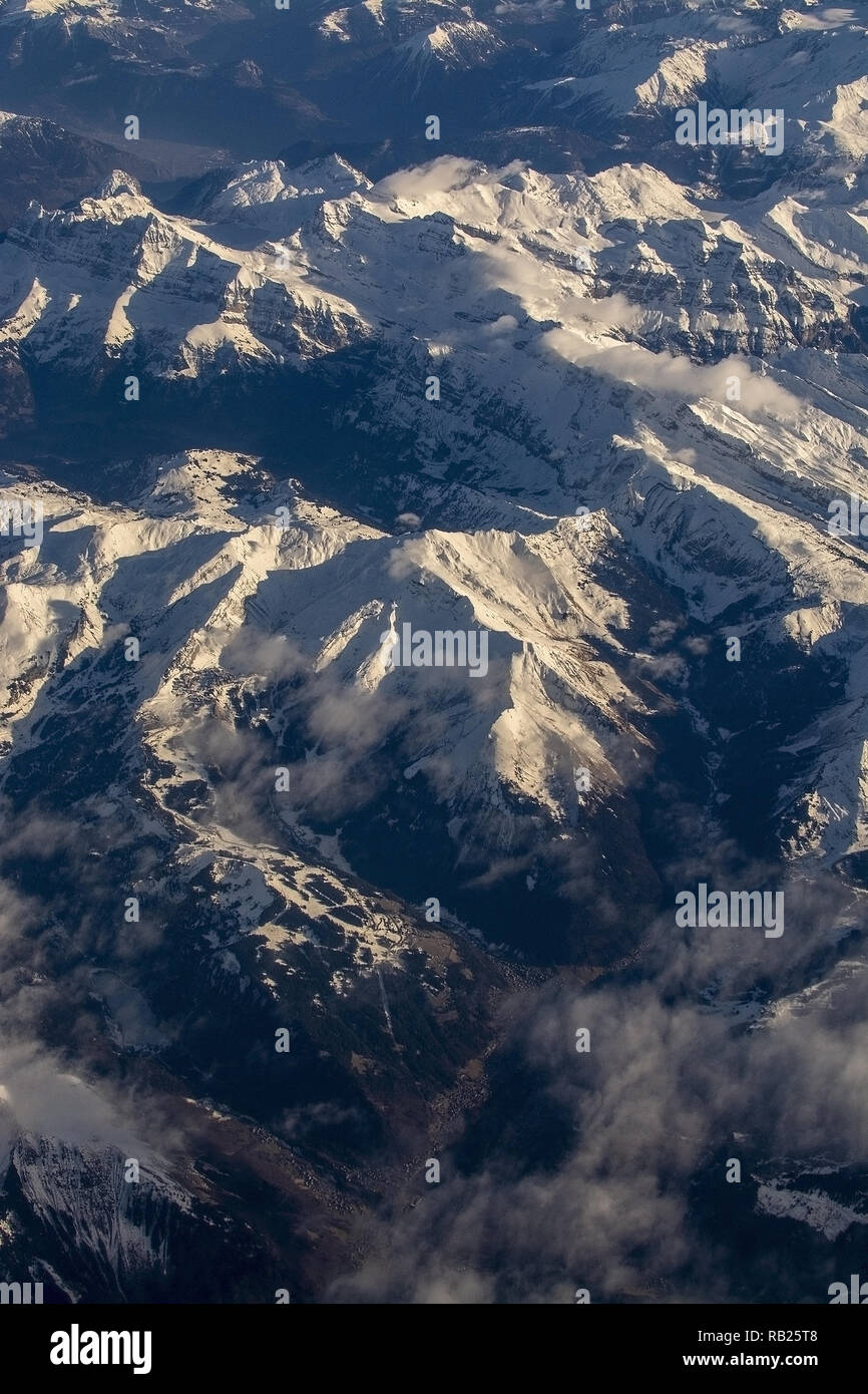 Swiss Alpes with snowy mountain tops aerial view towards the east ...