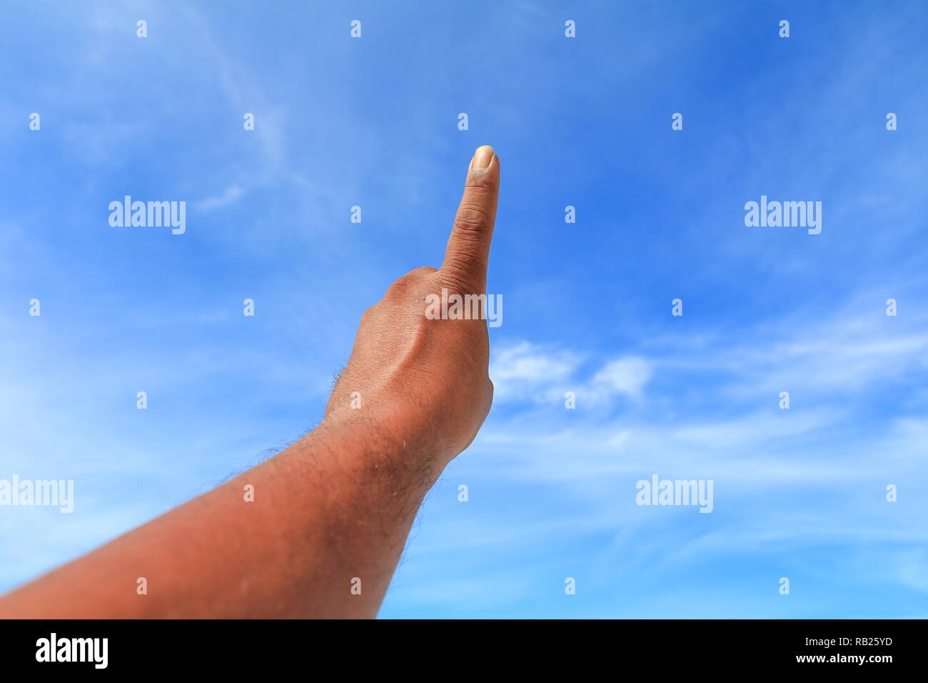 hand show counting number one on sky background Stock Photo - Alamy