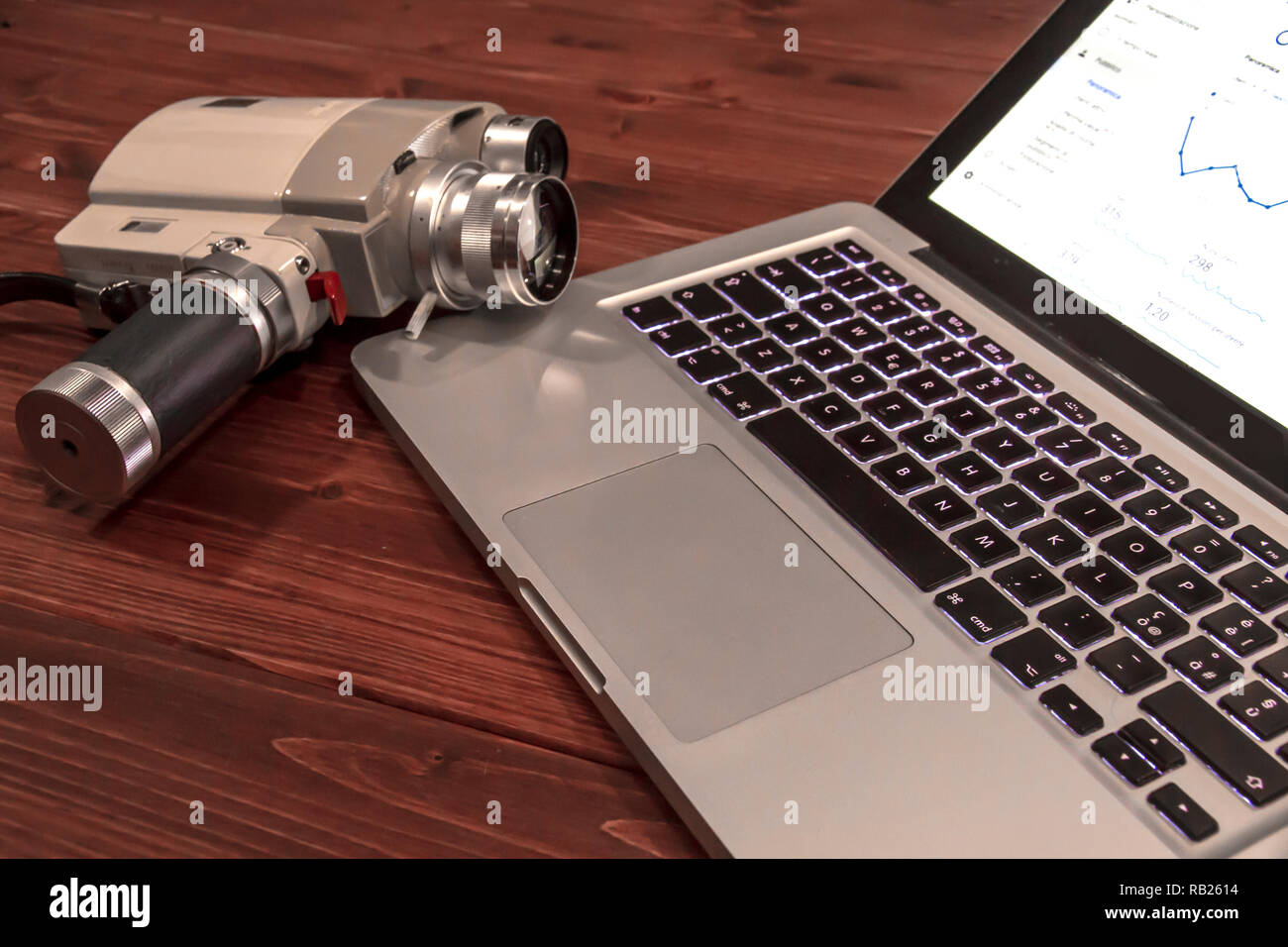 Contrast between different periods of technology: a vintage Super 8 ...