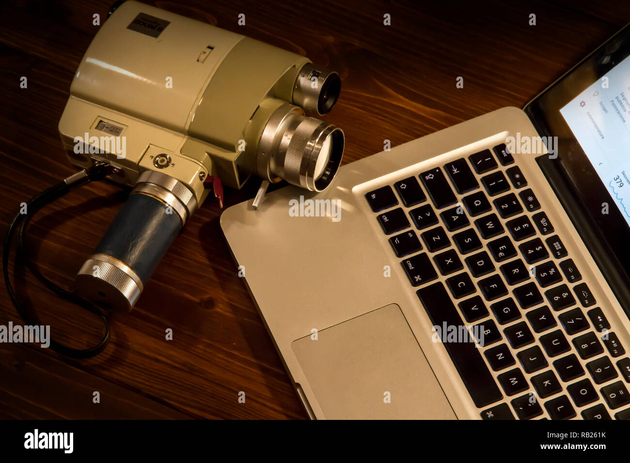 Contrast between different periods of technology: a vintage Super 8 ...