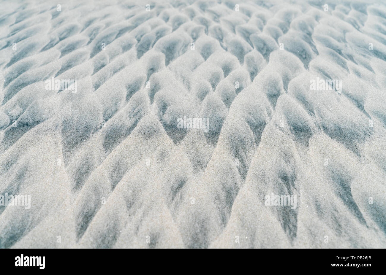 Abstract sand patterns caused by wind and rain on beach Stock Photo - Alamy