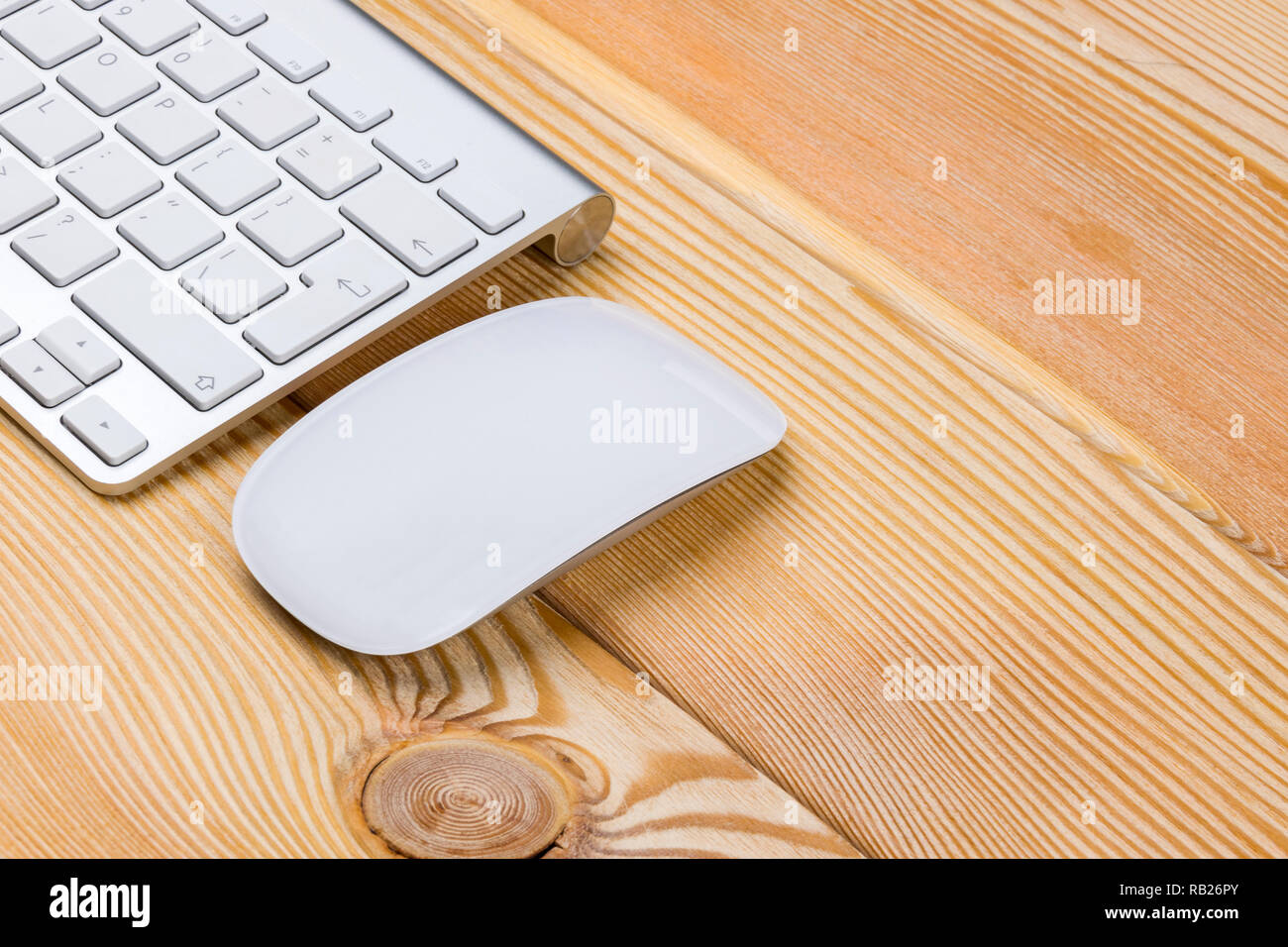 Business workplace with wireless keyboard and mouse on old natural ...