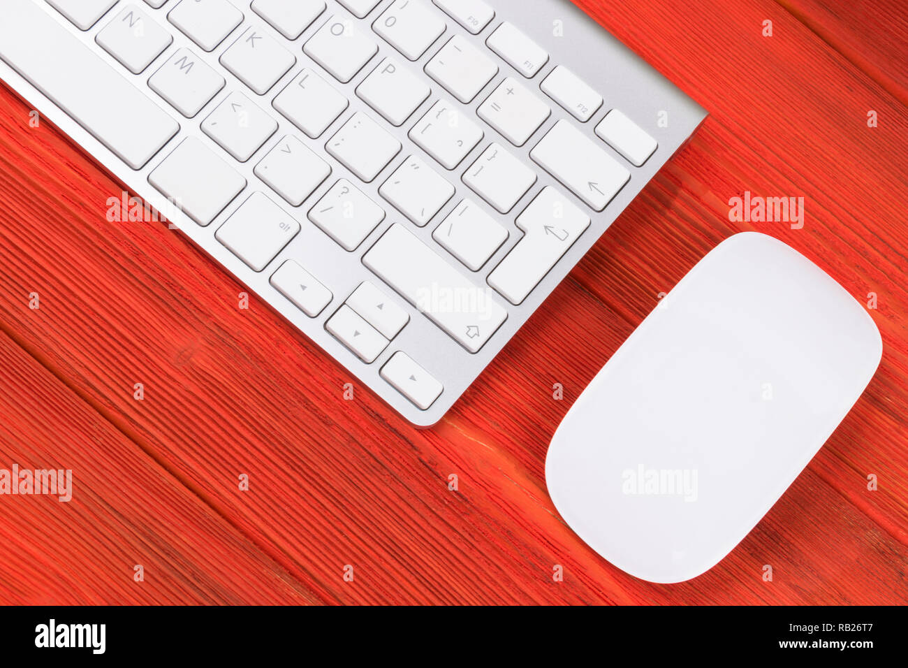 Business workplace with computer, wireless keyboard and mouse on old ...