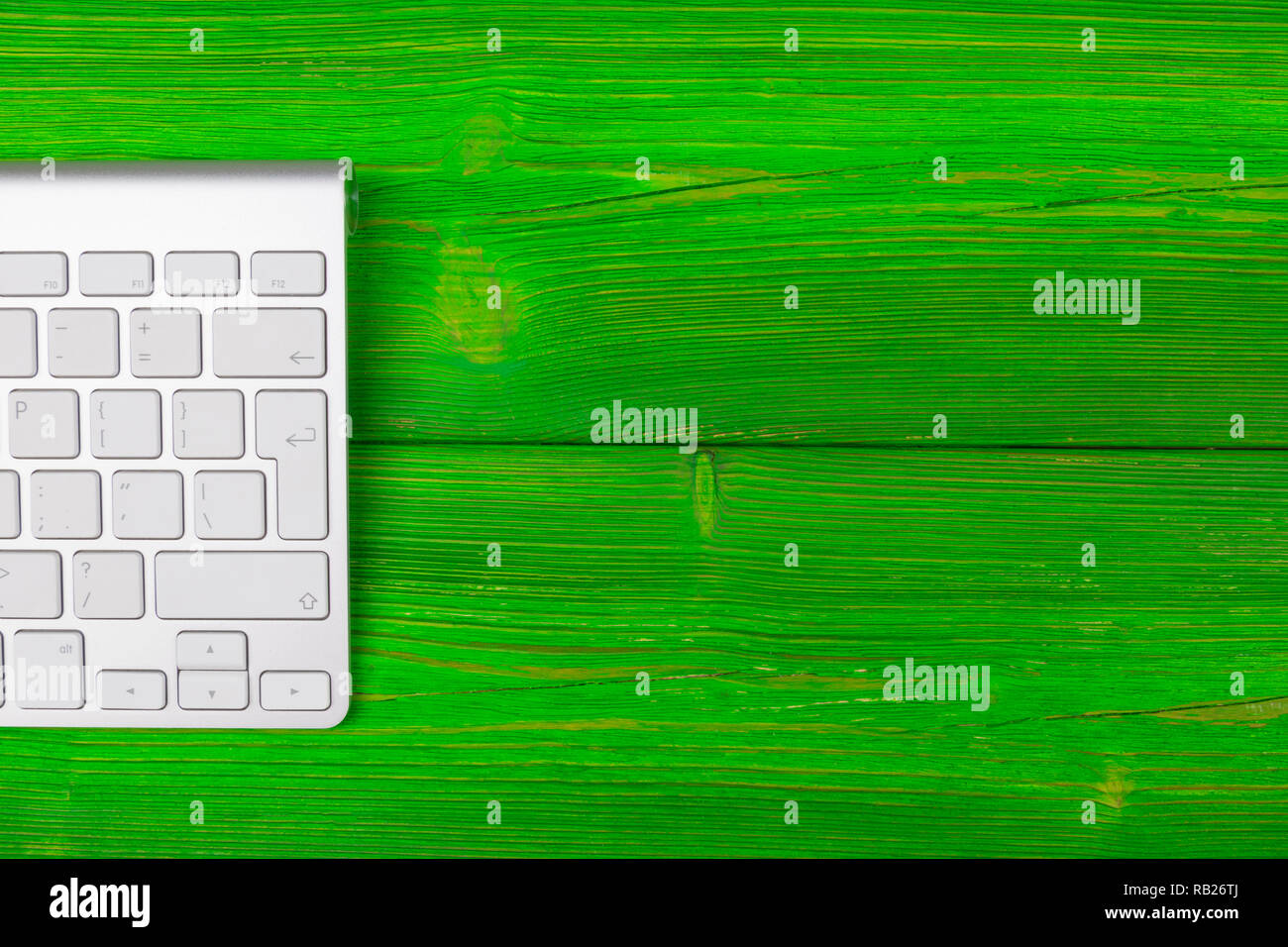 Close up view of a business workplace with wireless computer keyboard ...