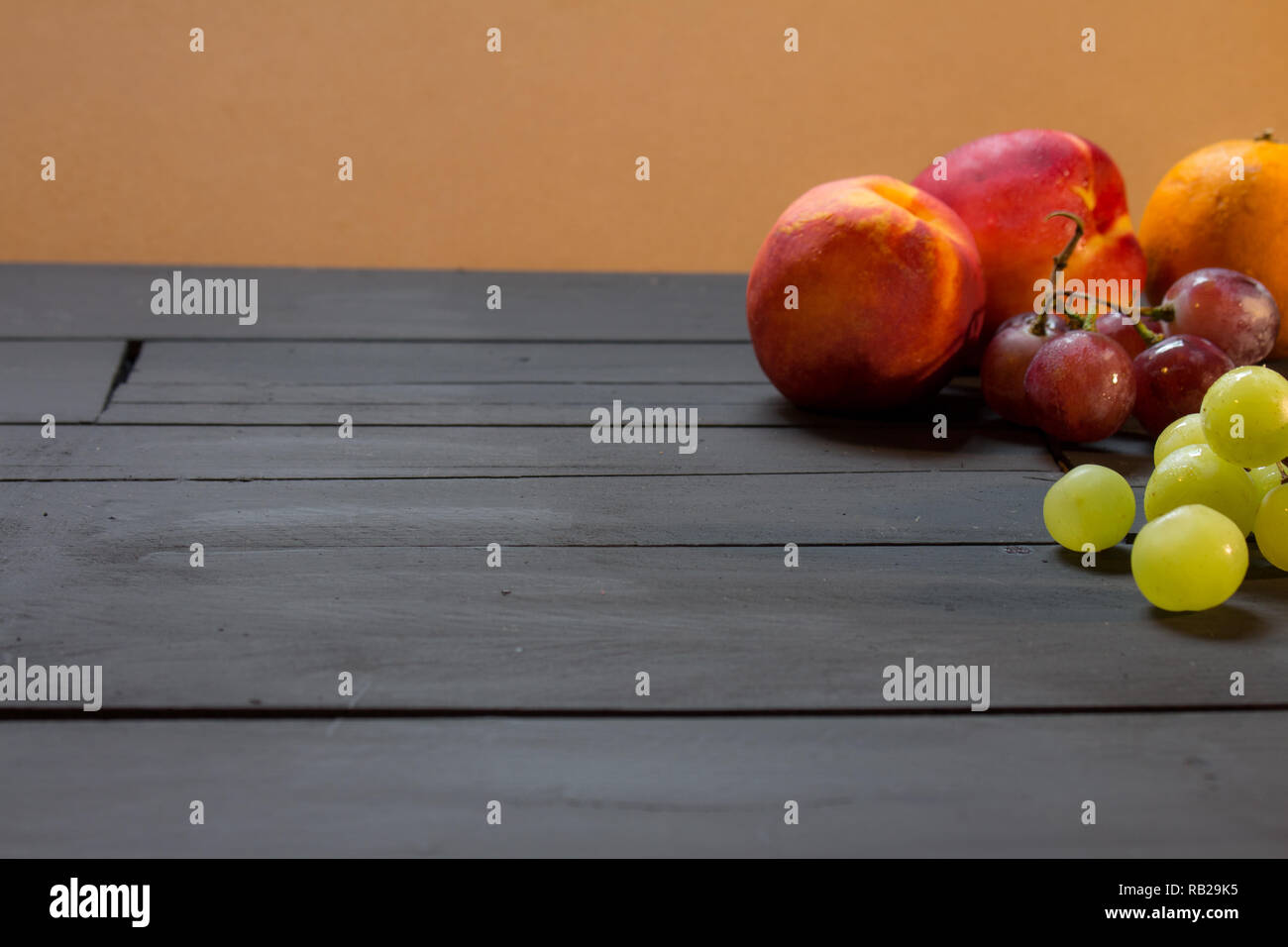 Group of fruits on a rustic background. Fruits of fresh colors Stock ...