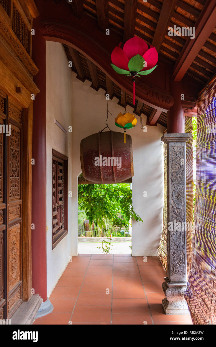 view of temple passage way with large temple drum- Buddhist temple ...