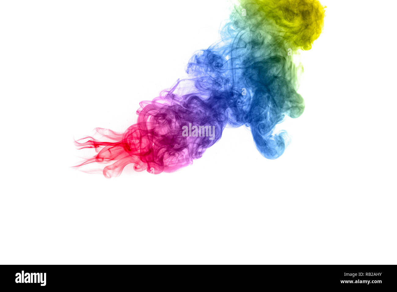 Multi color powder explosion on white background Stock Photo - Alamy