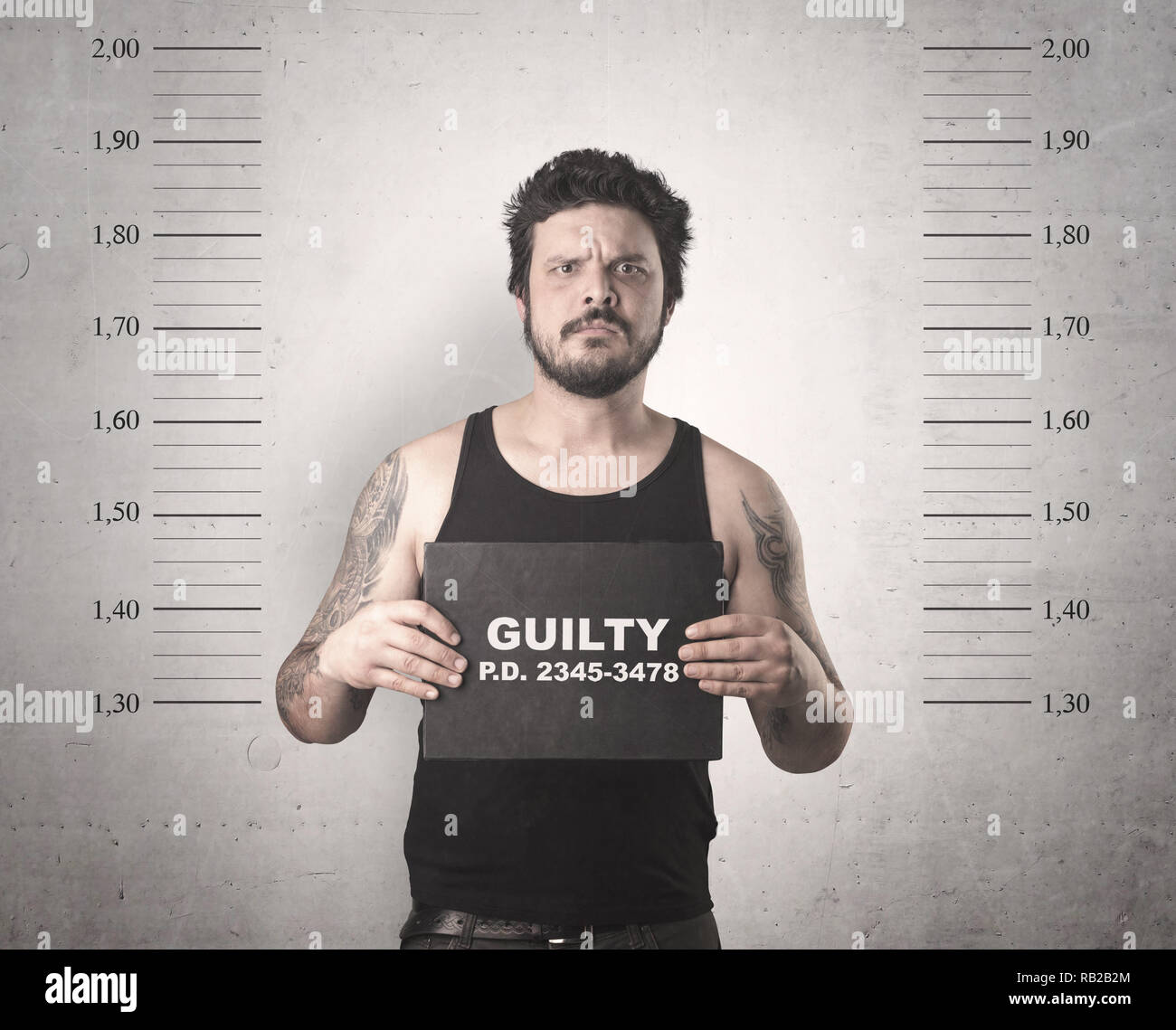 Caught guilty man with ID signs on his hand Stock Photo - Alamy