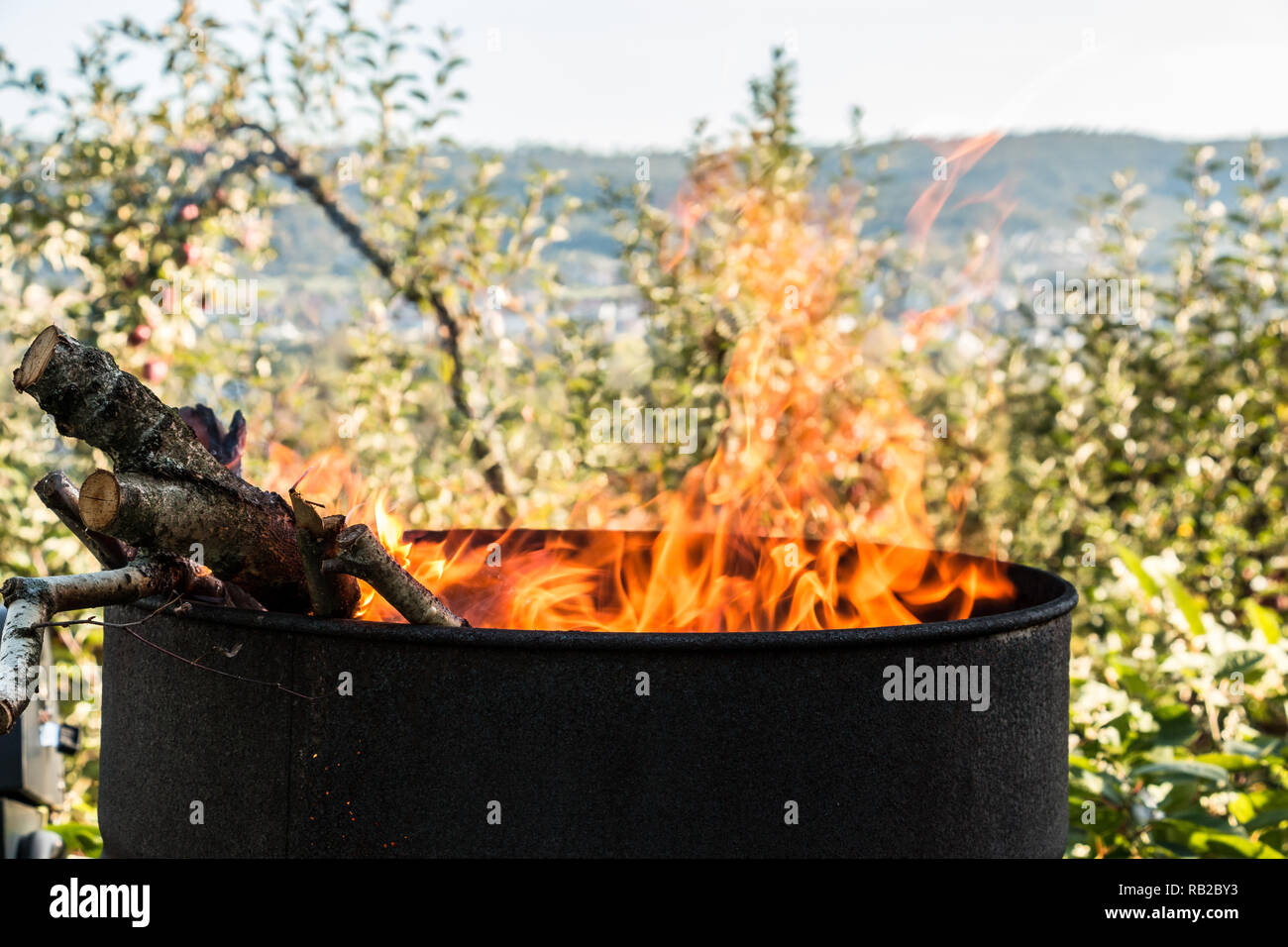 Burning waste in drum hi-res stock photography and images - Alamy