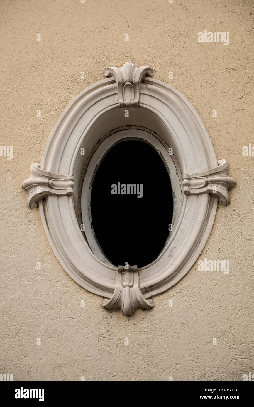 Old historical building with a round window Stock Photo - Alamy