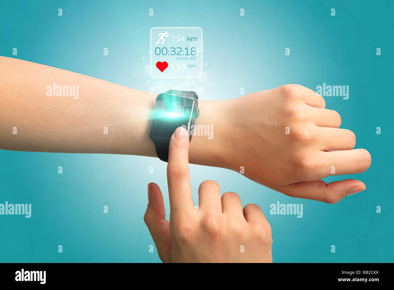 Female hand with smartwatch and running concept above Stock Photo - Alamy
