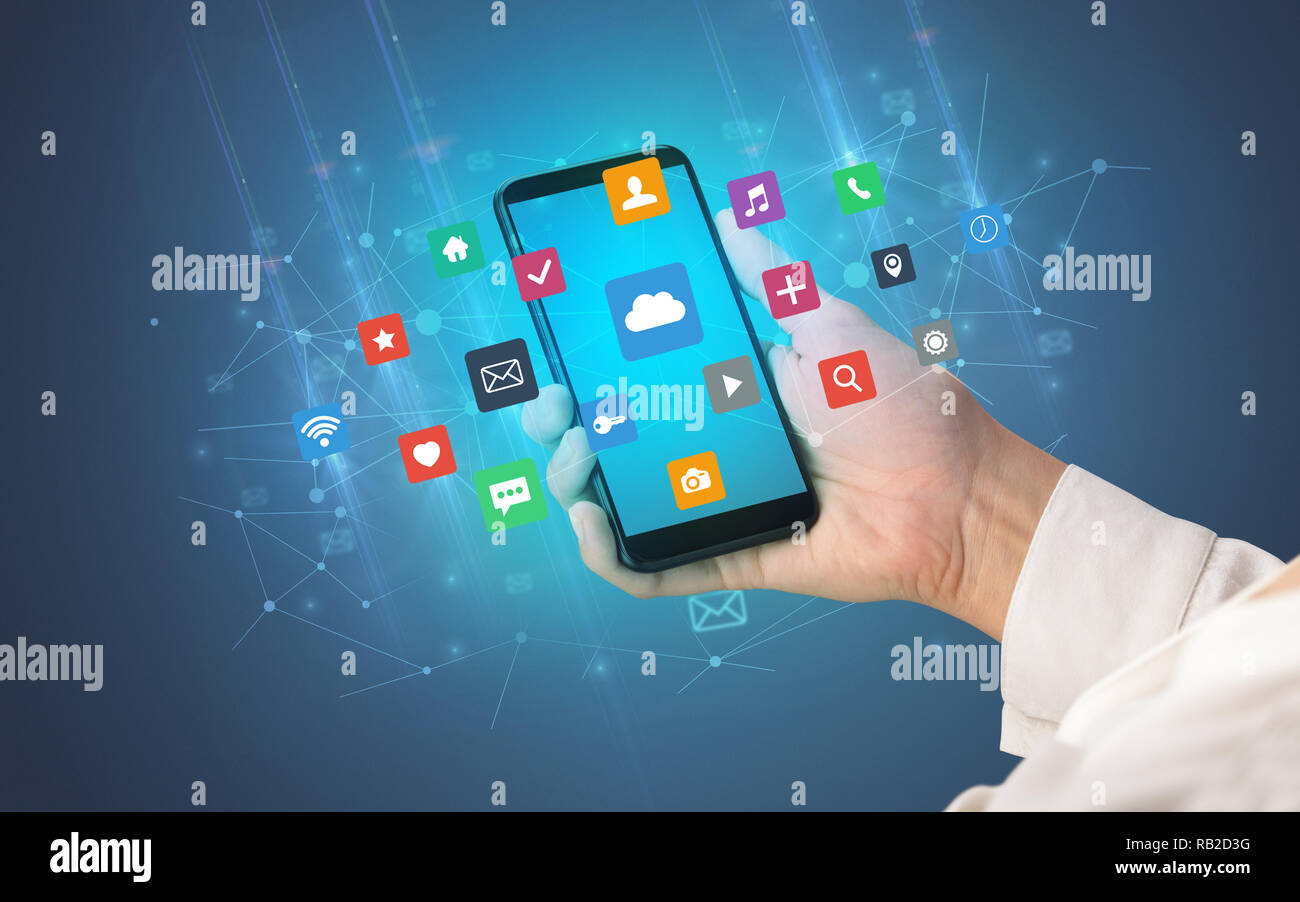 Female hand using smartphone with colorful application icons around ...
