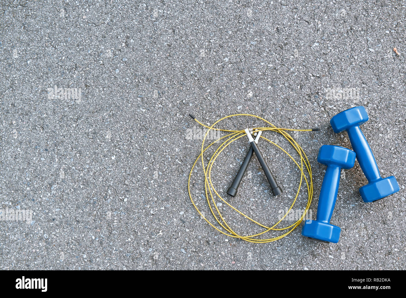 The best combination to lose weight. Jump rope and two blue lightweight ...