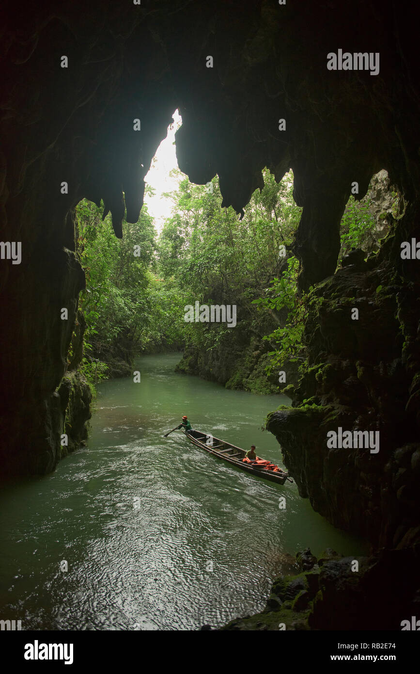 Boat heading into the Lussok Cave and underground river, Luna, Apayao ...