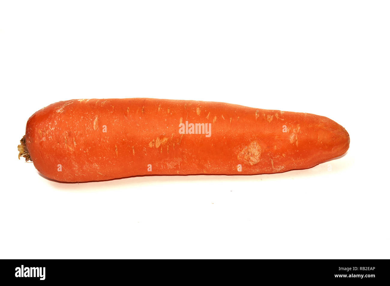 One whole carrots isolated on a white background. Isolate Stock Photo ...