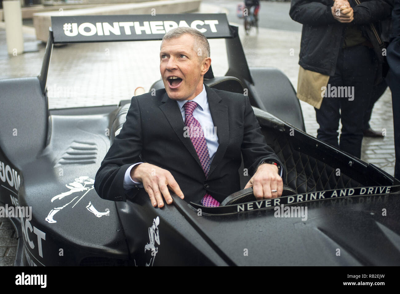 Former professional racing driver Mika Hakkinen poses with the Johnnie ...